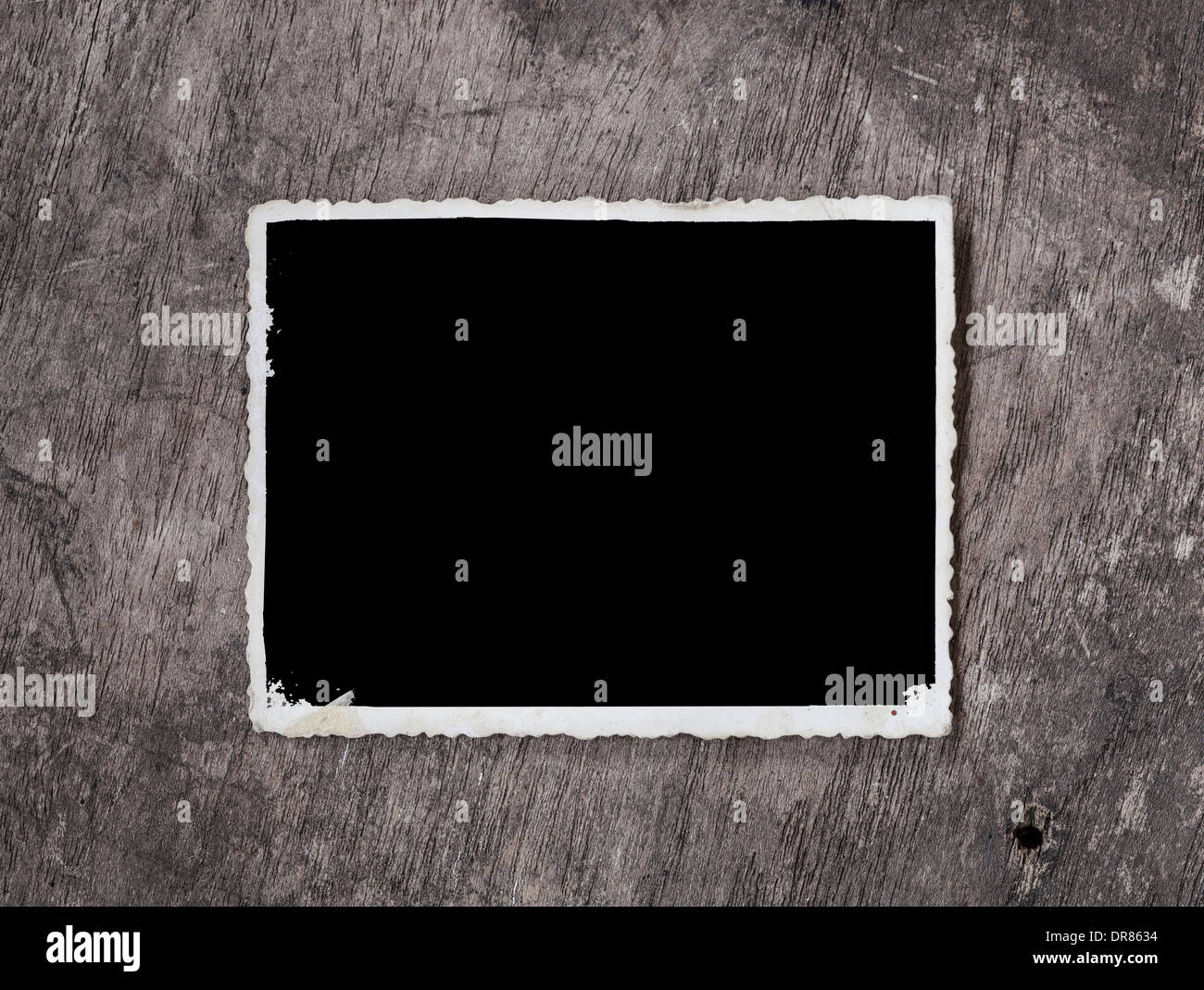 empty old photos frame on wooden wall Stock Photo - Alamy