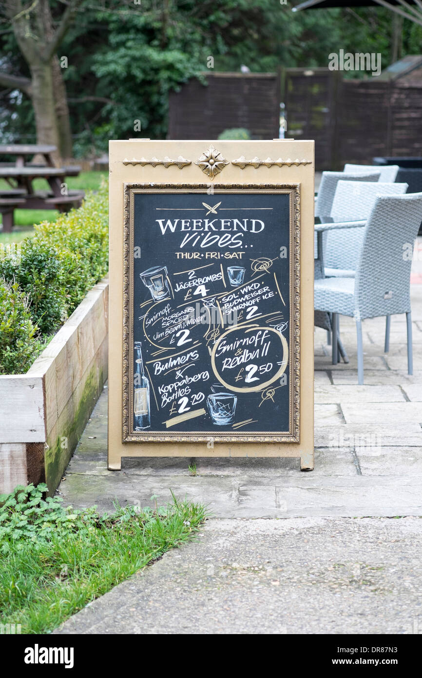UK pub chalk black board advertising weekend deals Stock Photo - Alamy