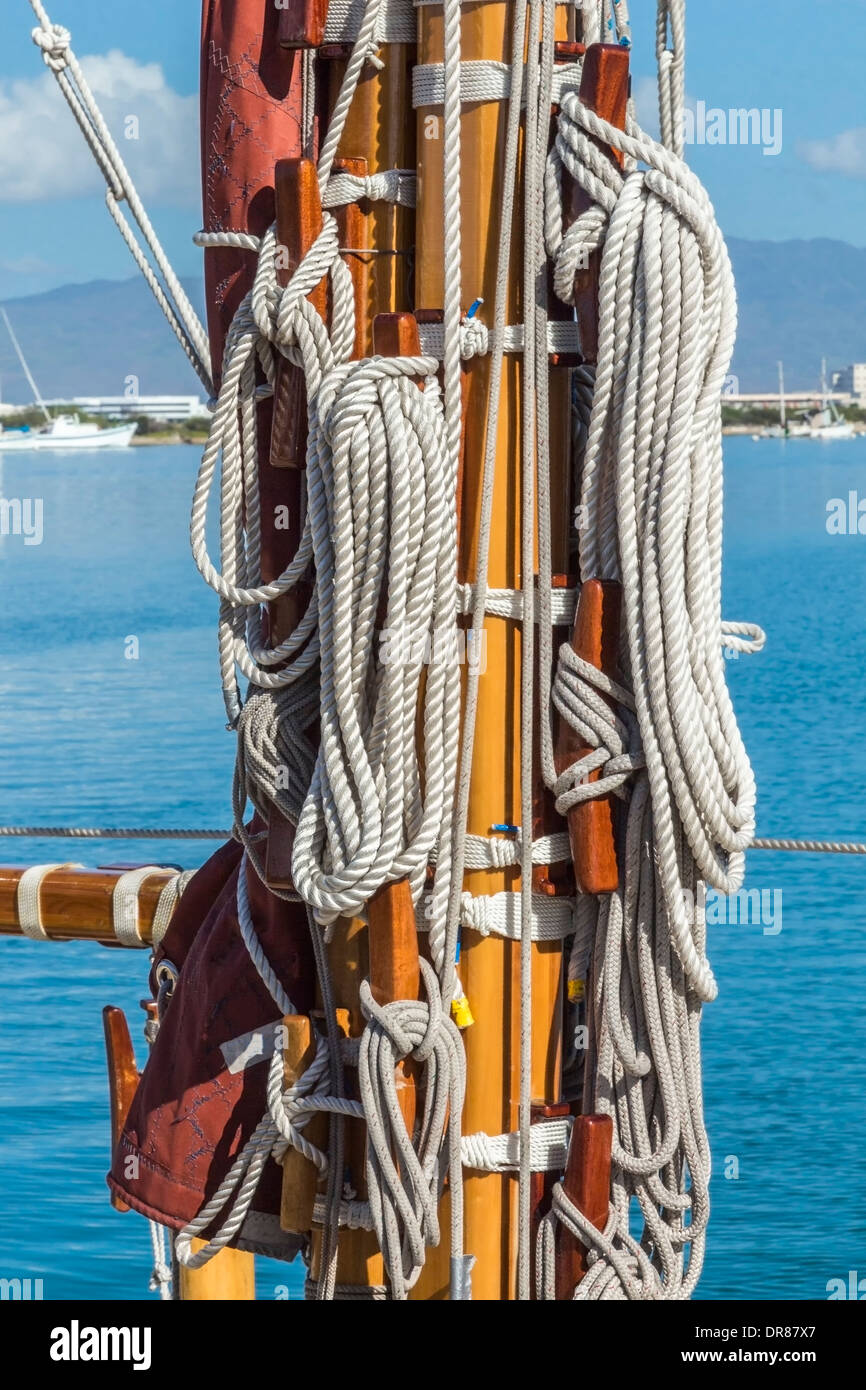 Details of sail rope on the mast of a sailboat Stock Photo - Alamy