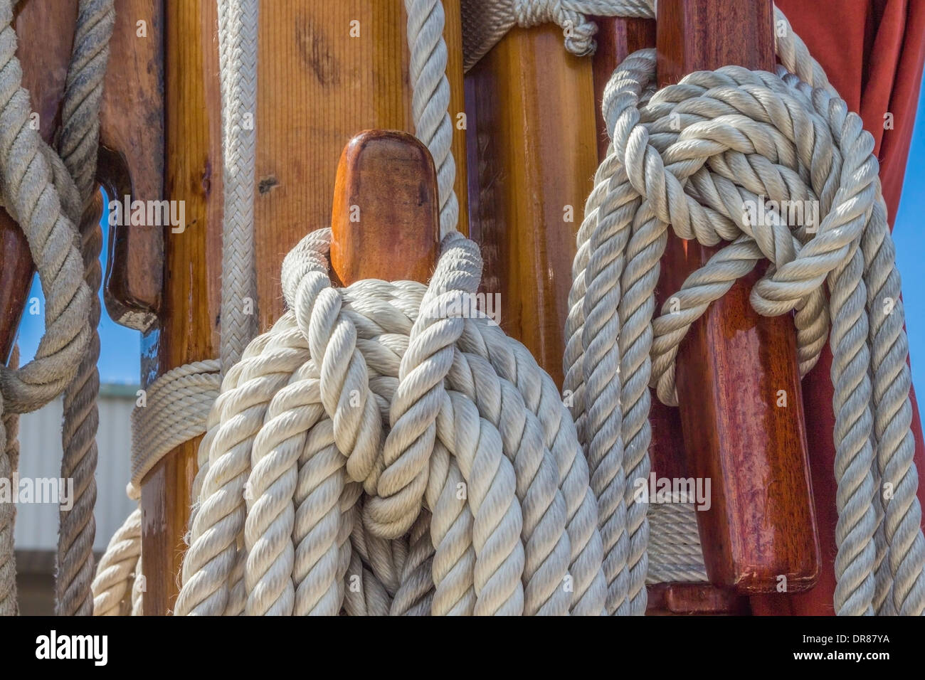 Details of sail rope on the mast of a sailboat Stock Photo - Alamy