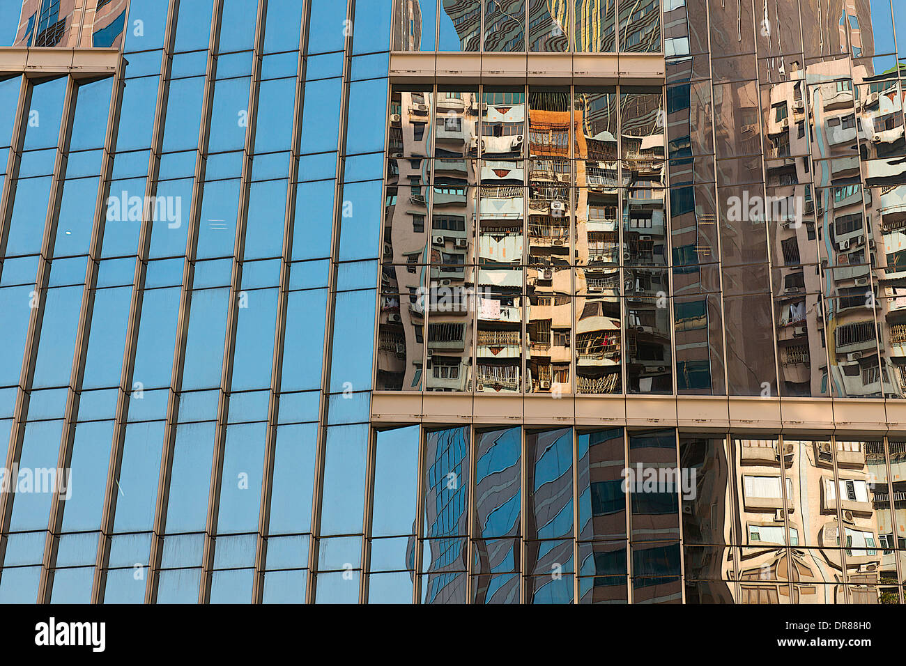 Apartments Reflected in the Window of a High-rise Building, Macau ...