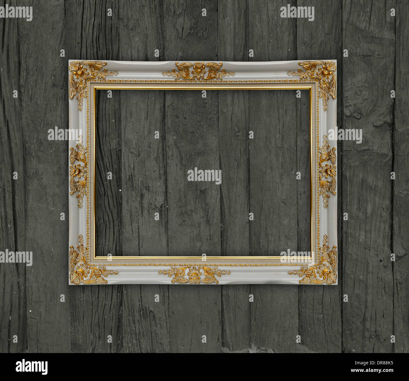 Old frame on vintage wood wall Stock Photo - Alamy