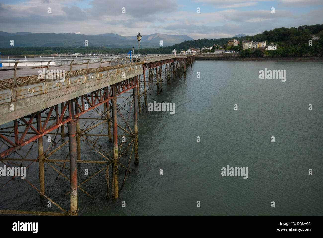 Bangor Pier, stretching towards the coast of North Wales, with the ...