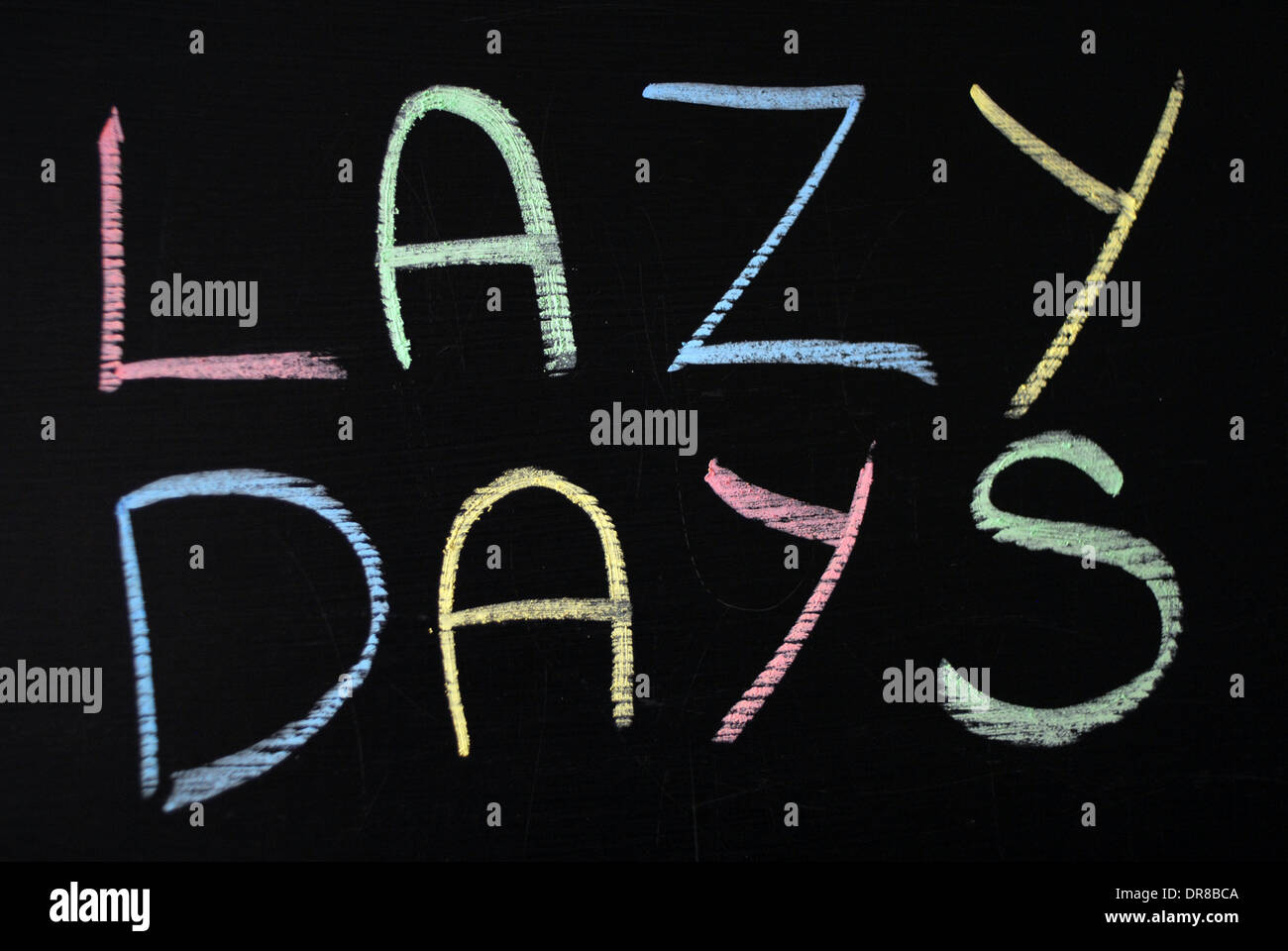 chalk writing - Lazy days. - words written on blackboard Stock Photo ...