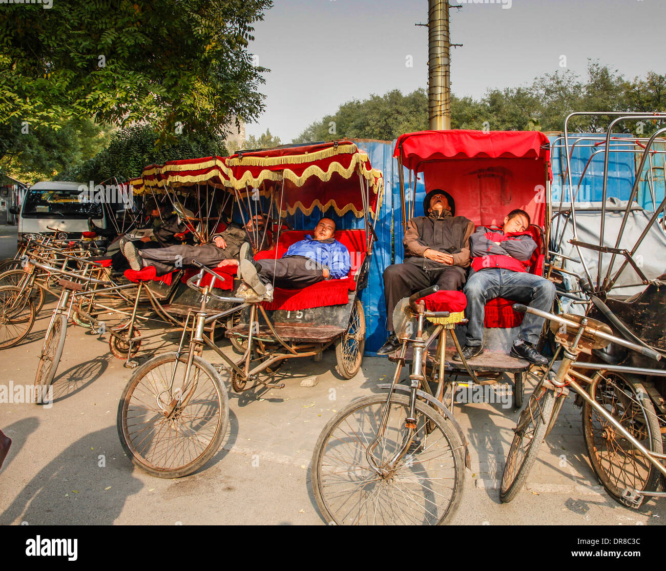 Beijing;China;Rickshaw or Trishaw drivers a sleep at their lunch break ...
