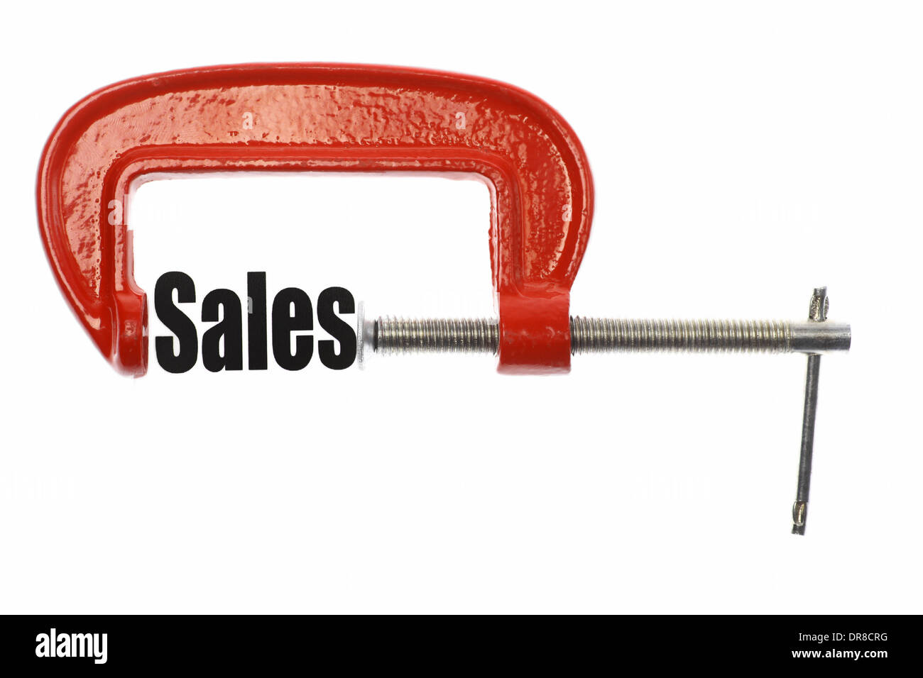 The word "Sales" is compressed with a vice. Business metaphor Stock ...