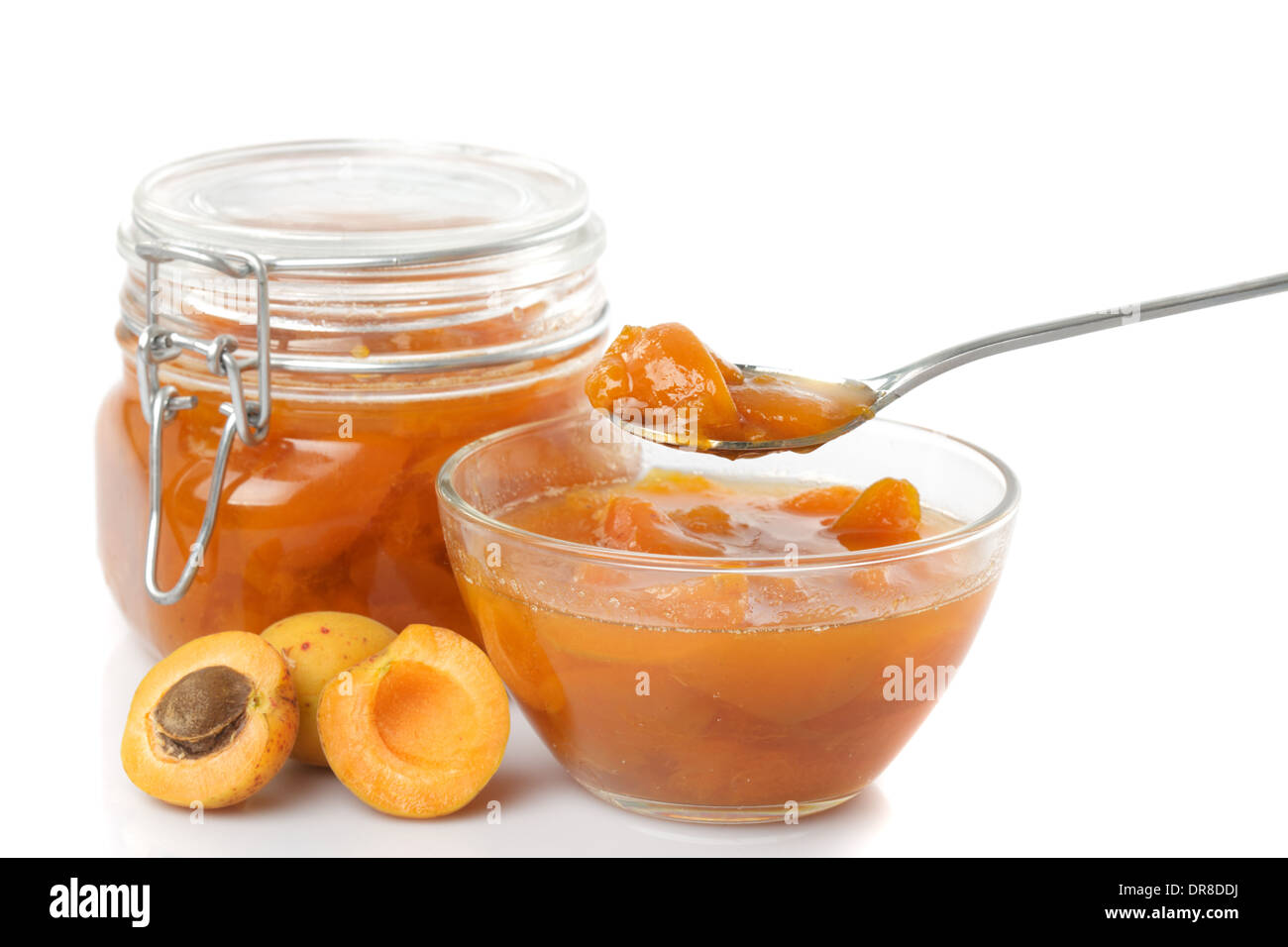 Apricot jam with fresh fruits isolated on white Stock Photo - Alamy