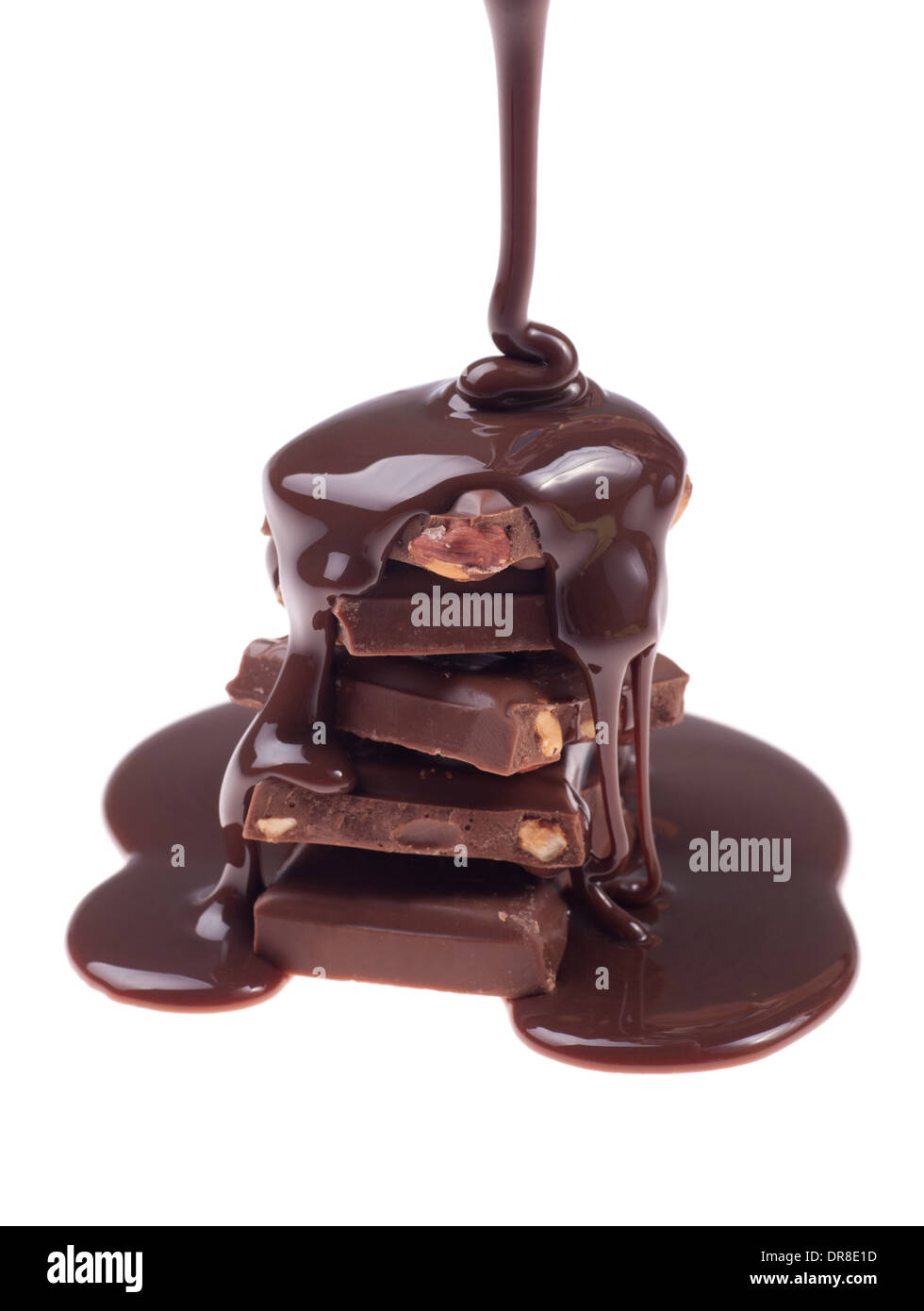 Chocolate flow isolated on white background close up Stock Photo - Alamy