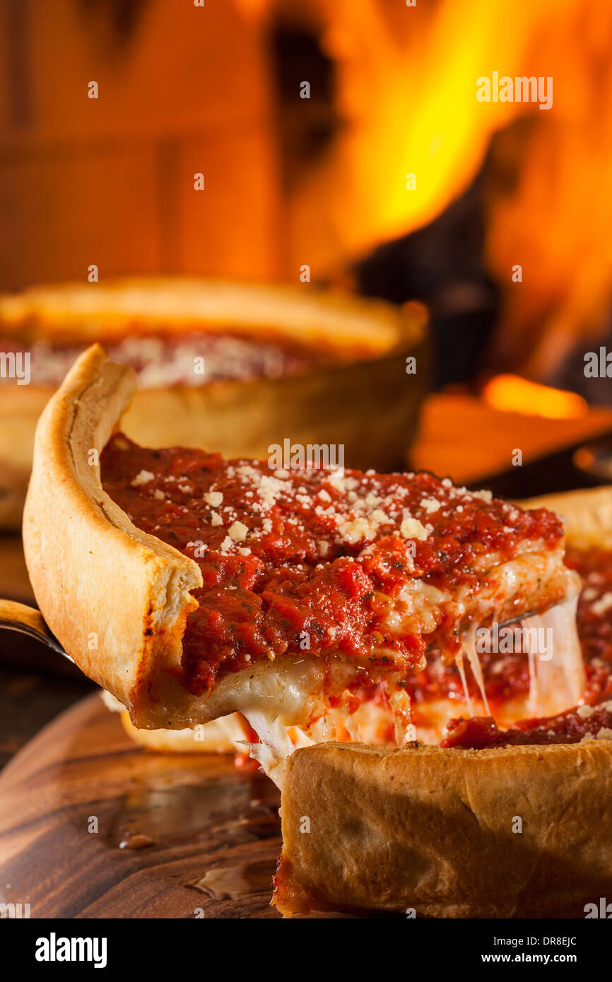 Chicago Style Deep Dish Cheese Pizza with Tomato Sauce Stock Photo - Alamy