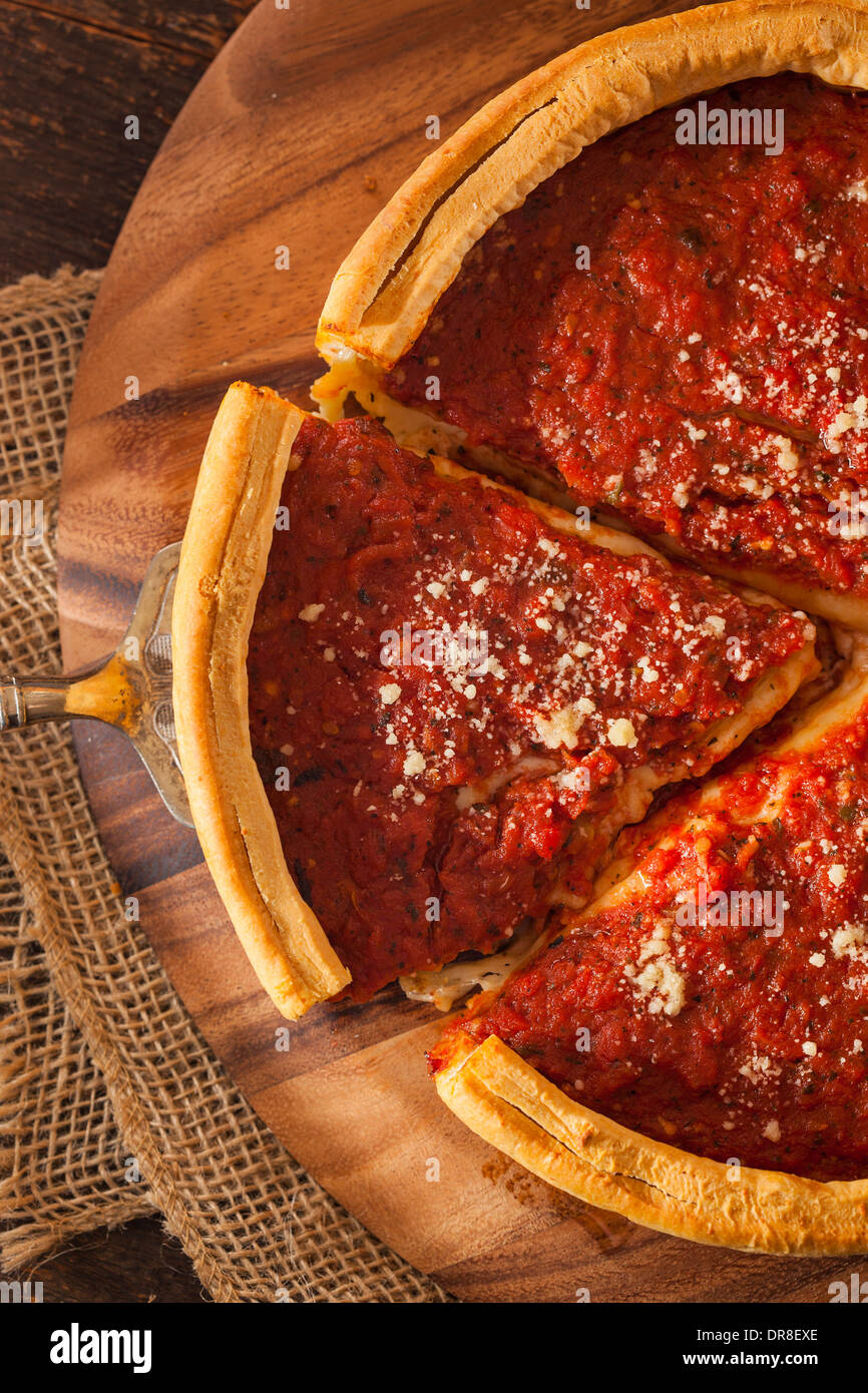 Chicago Style Deep Dish Cheese Pizza with Tomato Sauce Stock Photo - Alamy
