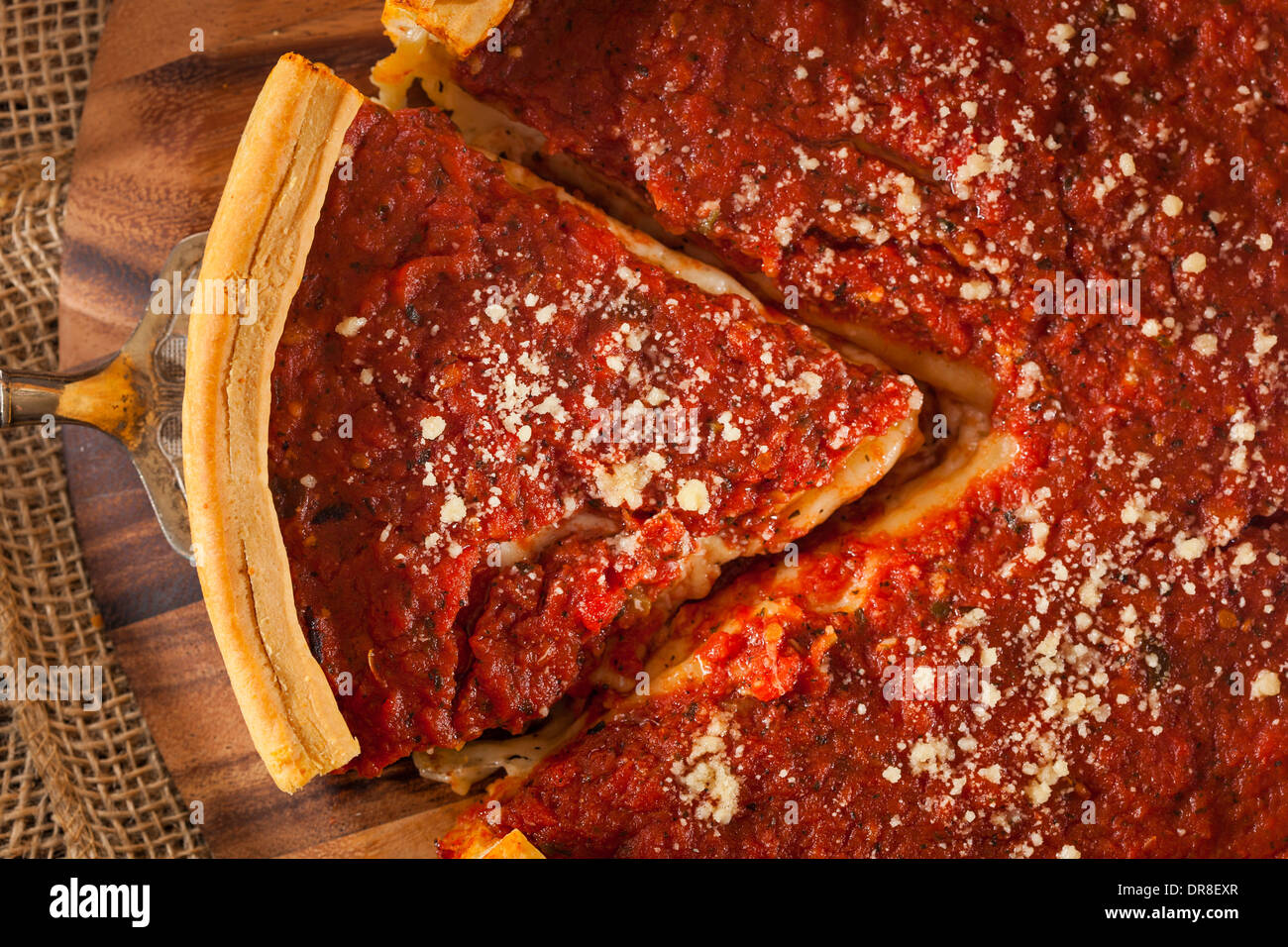 Chicago Style Deep Dish Cheese Pizza with Tomato Sauce Stock Photo - Alamy