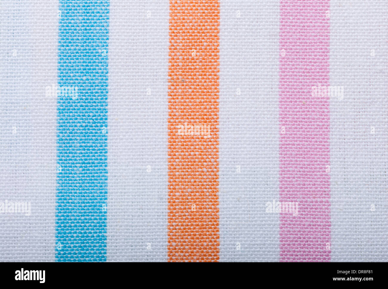 Closeup of colorful vertical striped fabric textile as background ...