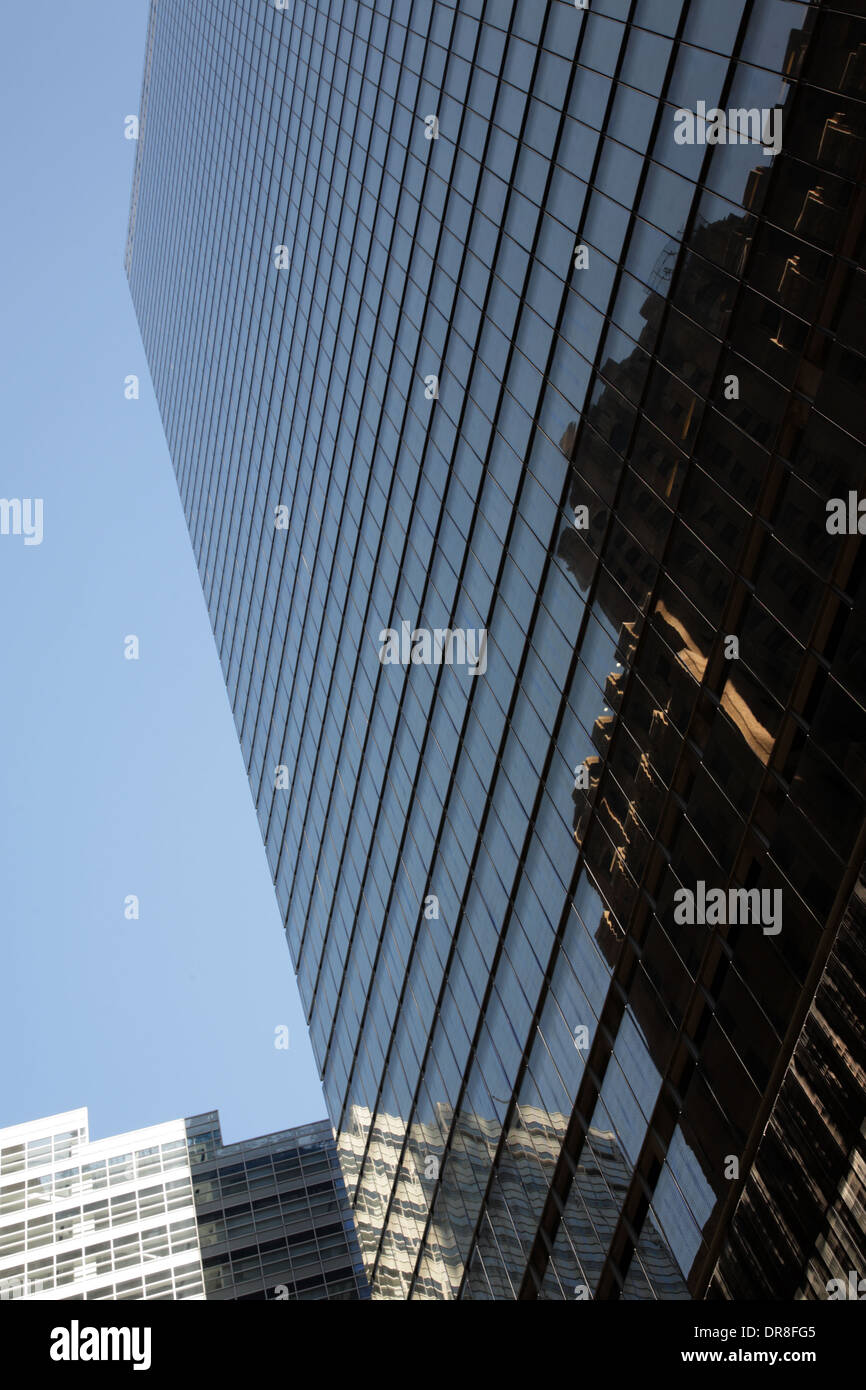 Modern building reflecting an old building, Manhattan, New York Stock ...