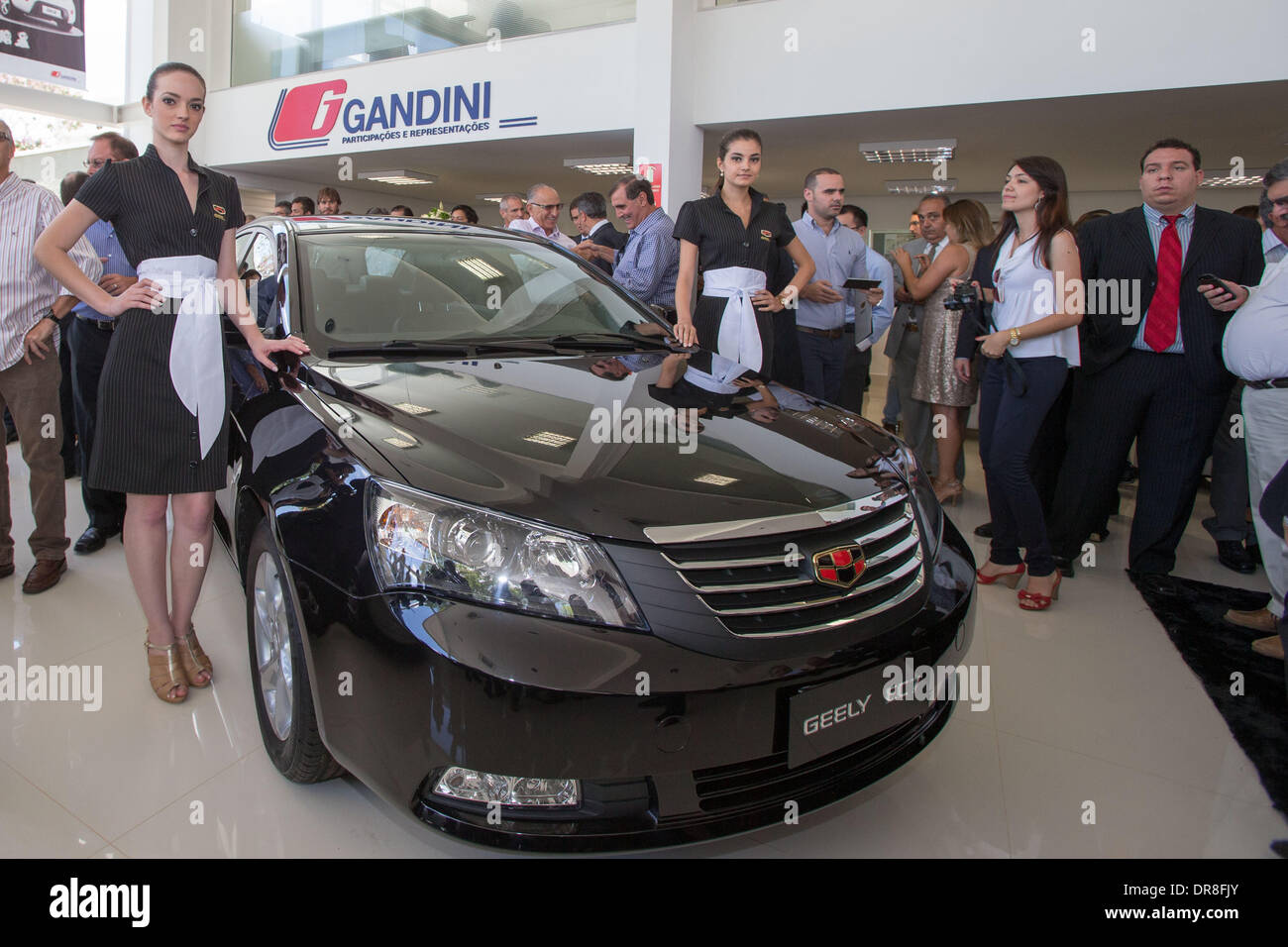 Sao Paulo, Brazil. 22nd Jan, 2014. Models present an Emgrand EC7 car ...