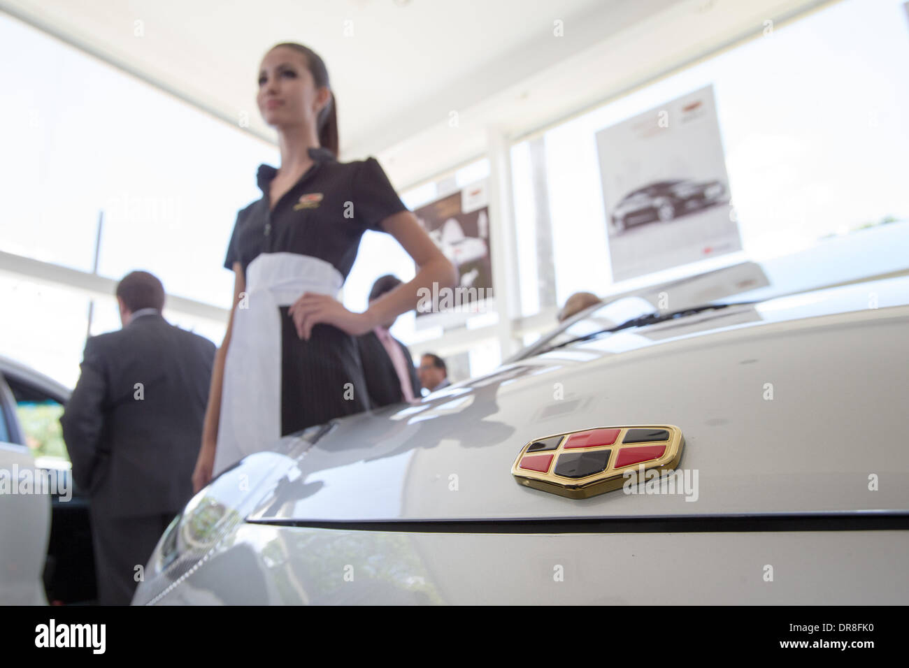 Sao Paulo, Brazil. 22nd Jan, 2014. A model presents a model car during ...