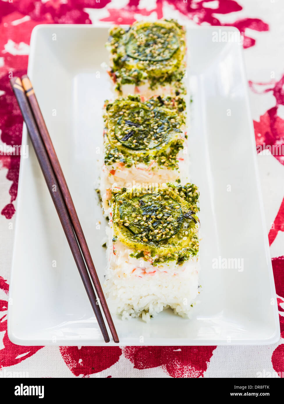 California pan sushi made of seasoned rice topped with seafood, sliced ...