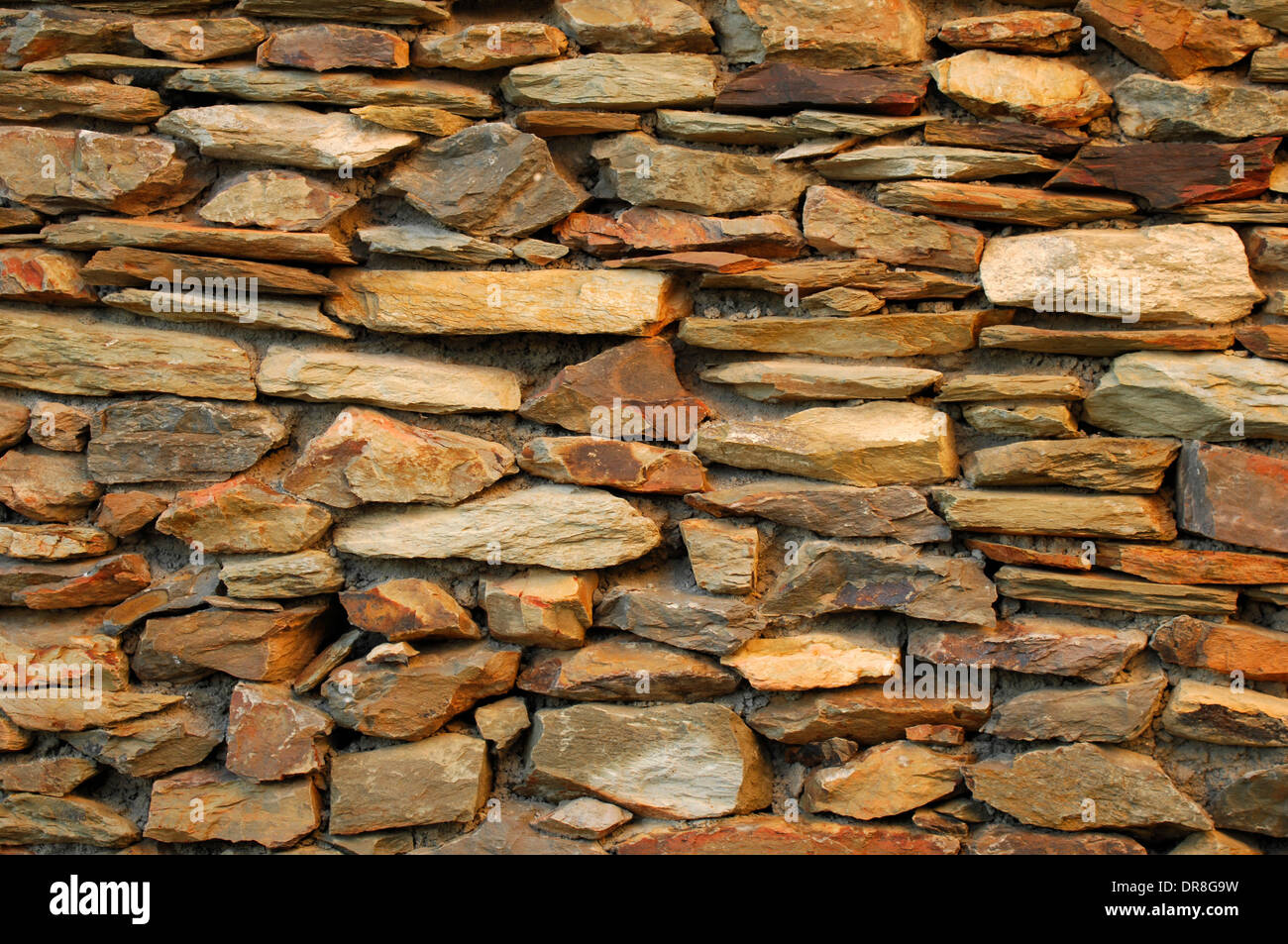A close up shot of a stone feature wall Stock Photo - Alamy