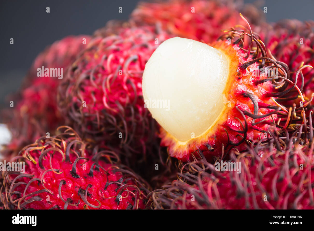 Rambutan is a tropical sweet and sour, white, translucent fruit with a ...