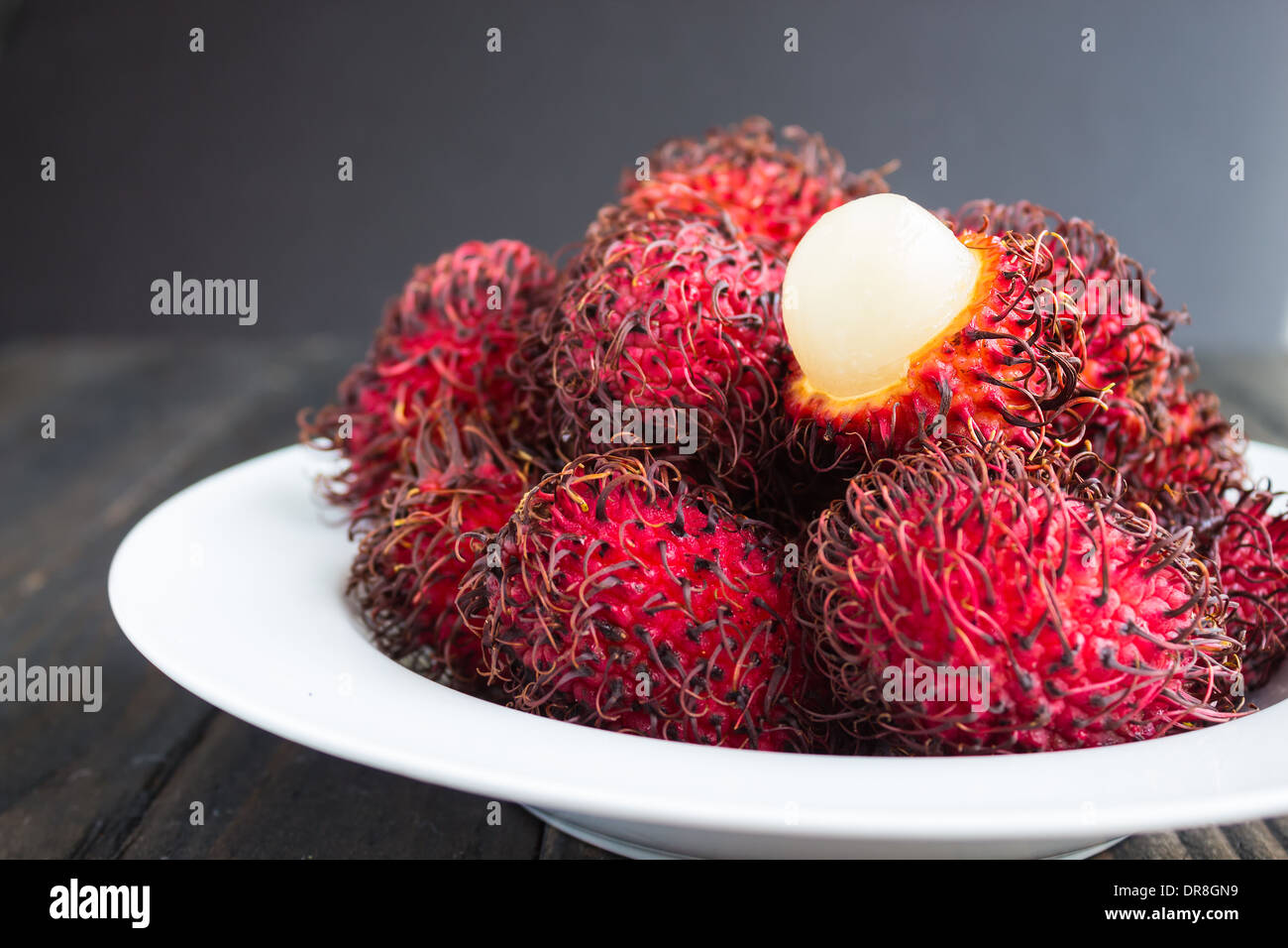 Rambutan is a tropical sweet and sour, white, translucent fruit with a ...