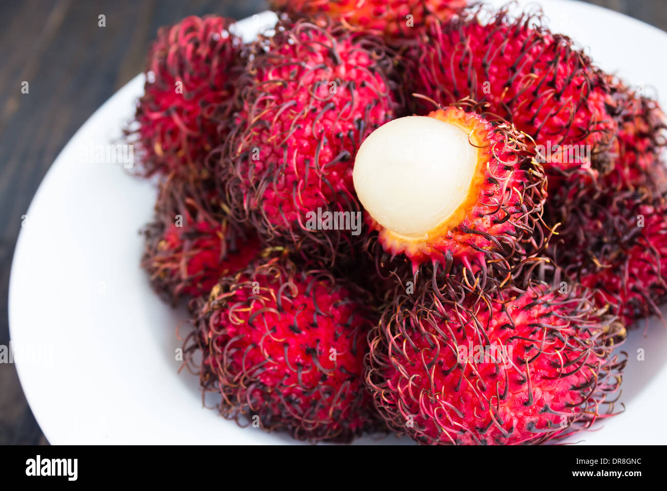 Rambutan is a tropical sweet and sour, white, translucent fruit with a ...