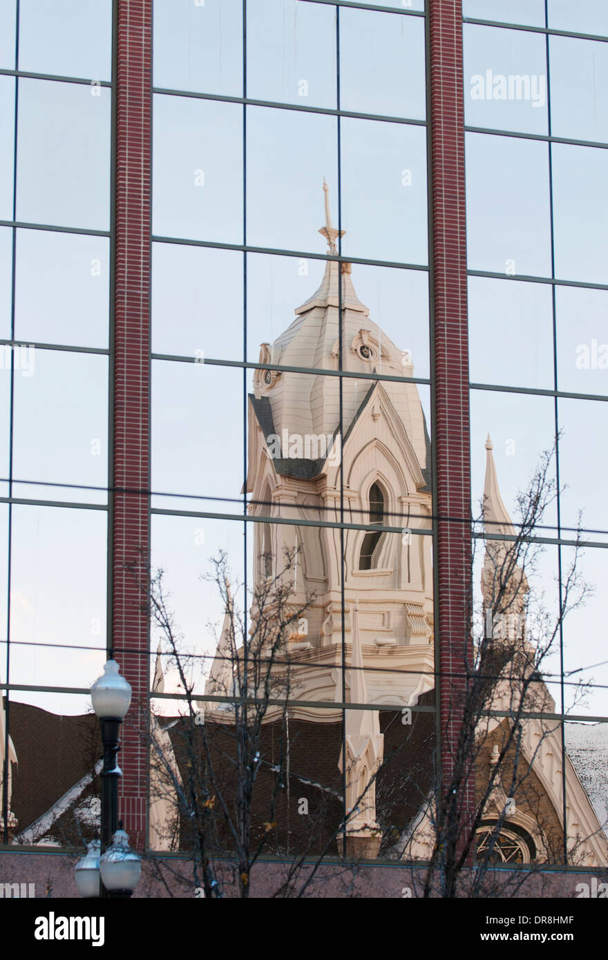 The Assembly Hall in Temple Square is reflected in modern buildings in ...