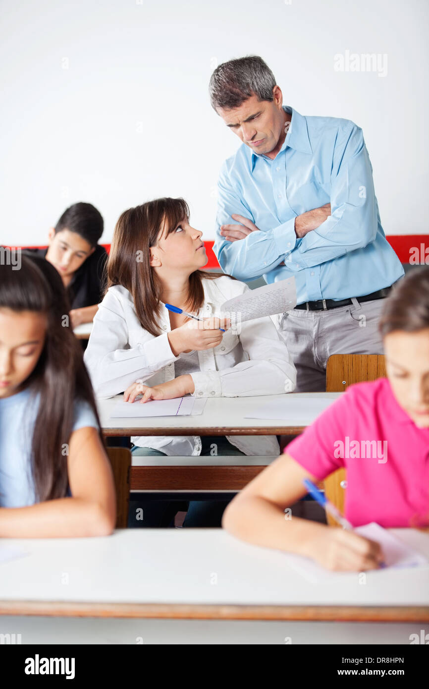 Angry Teacher Looking At Student Stock Photo - Alamy