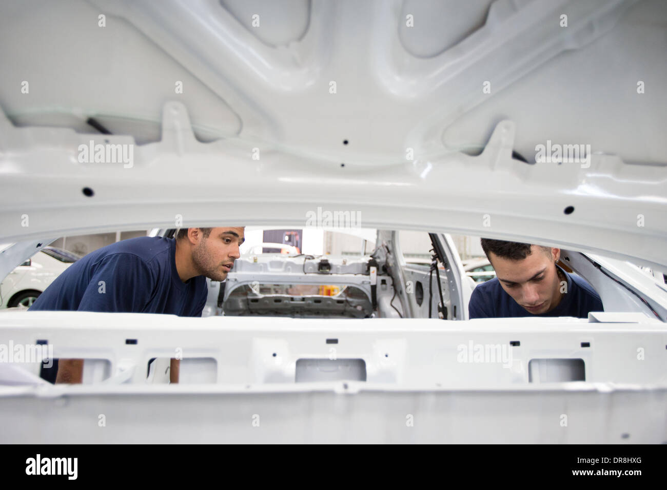 Montevideo, Uruguay. 22nd Jan, 2014. Workers assemble a car in the car ...