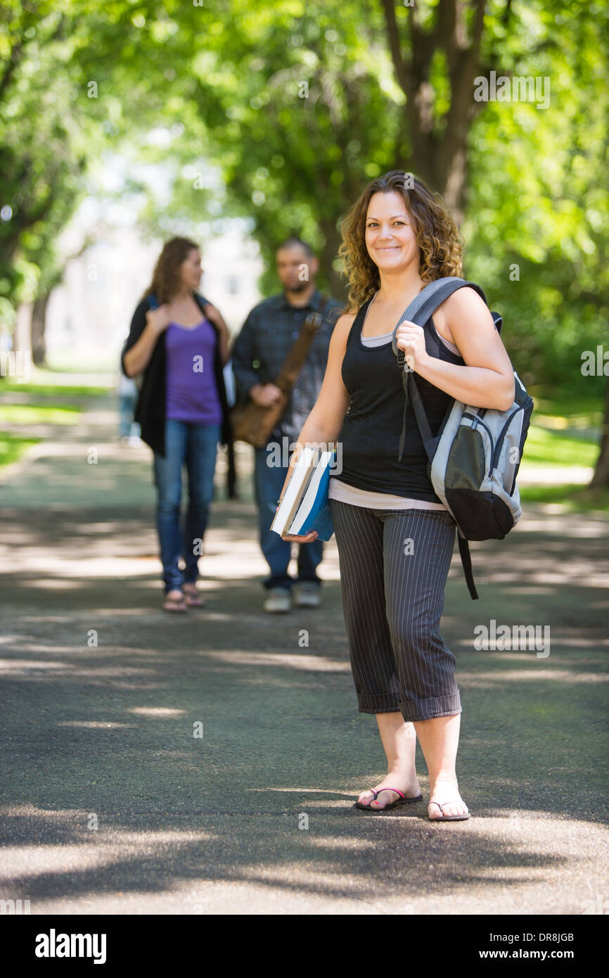 Portrait Of University Student Standing On Campus Stock Photo - Alamy