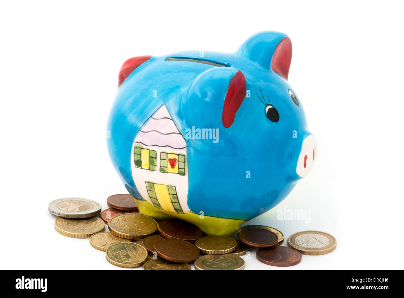 Porcelain piggy bank money box with coins Stock Photo - Alamy