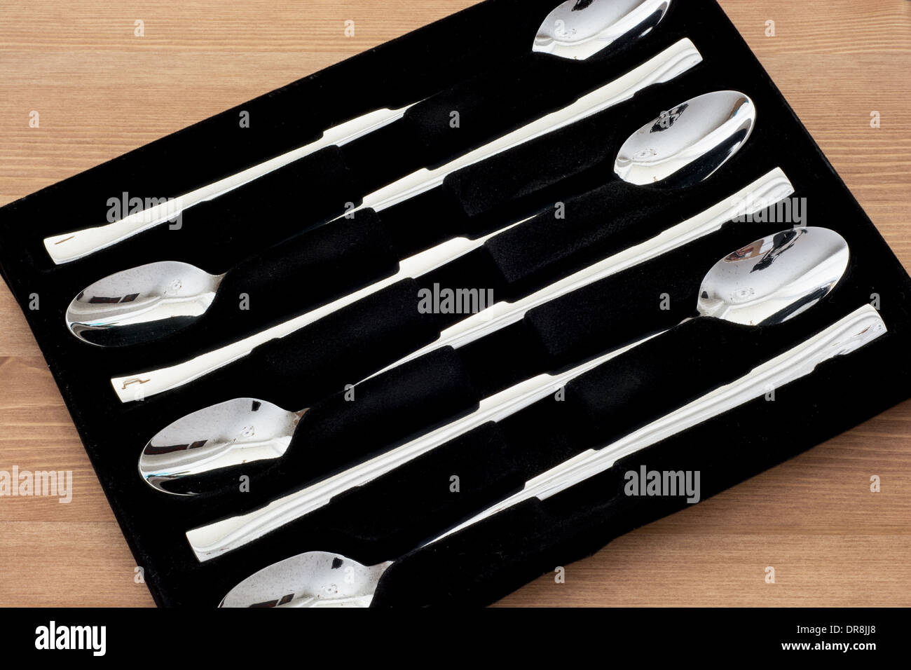 Set of stainless steel spoons Stock Photo - Alamy
