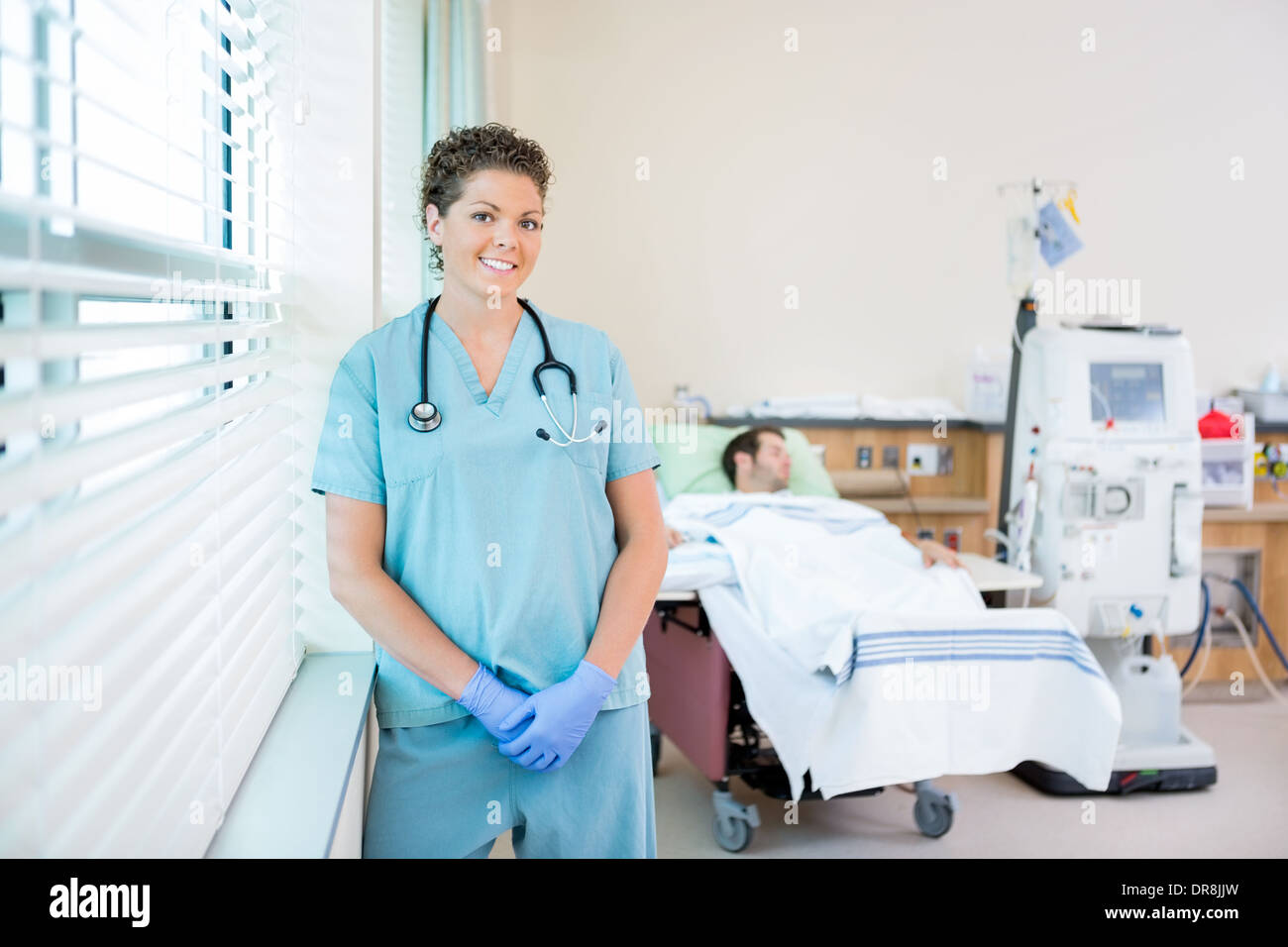 Nurse With Patient Receiving Renal Dialysis In Hospital Stock Photo - Alamy