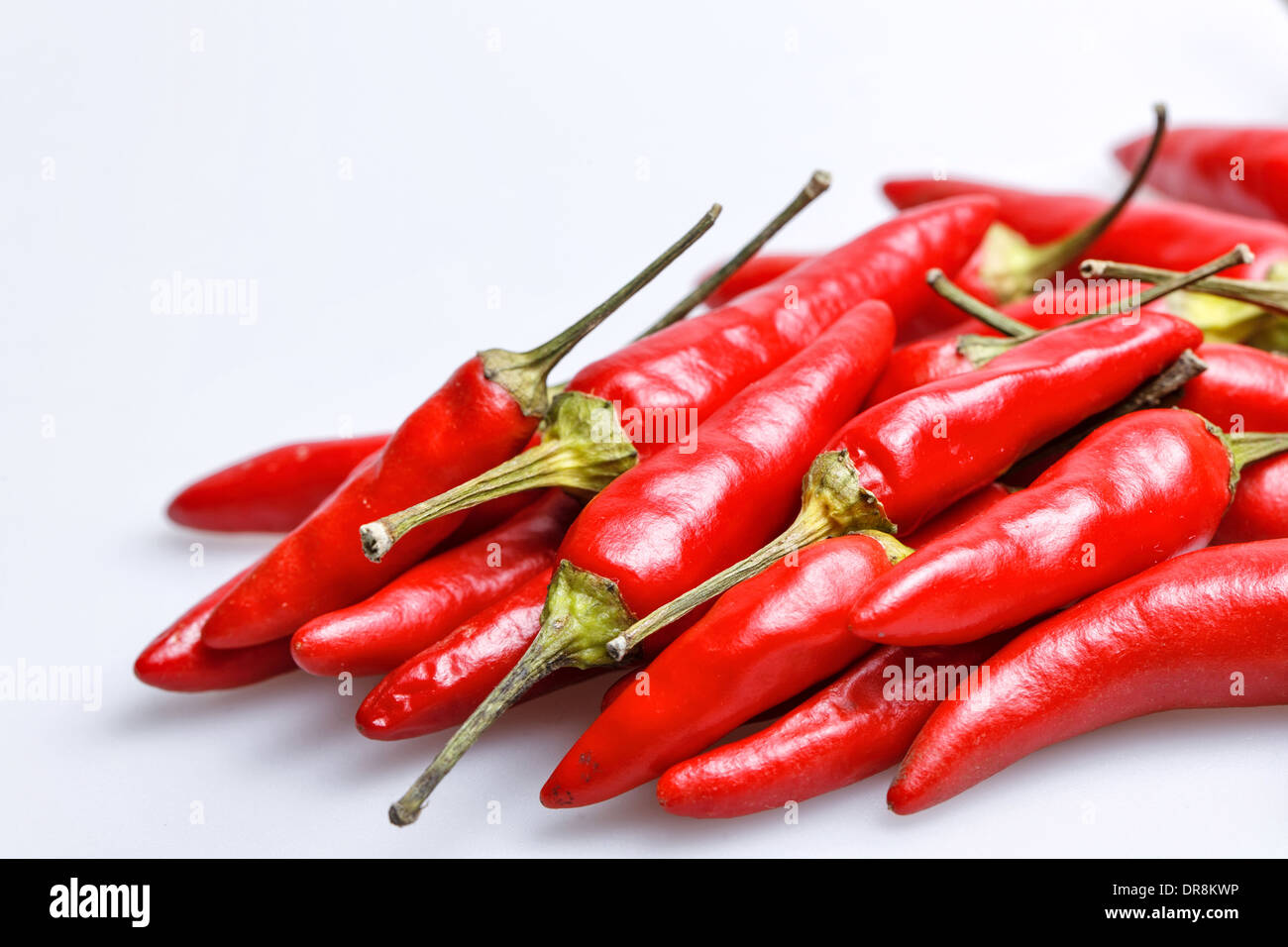 Group raw red chili peppers closeup shot Stock Photo - Alamy