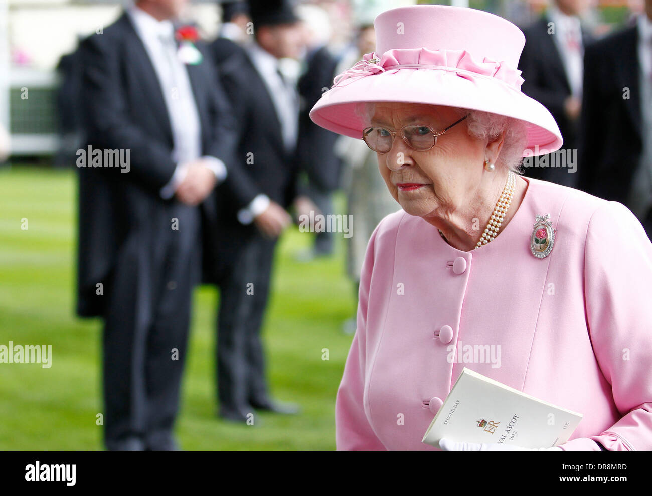 Queen Elizabeth in the paddock before her horse Carlton House runs ...