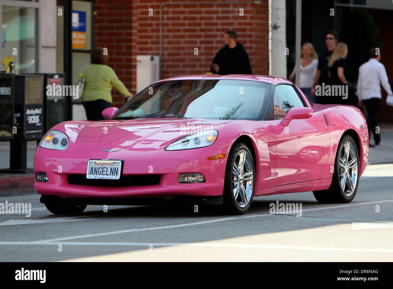 Los Angeles icon, Angelyne drives down the street in Beverly Hills in ...