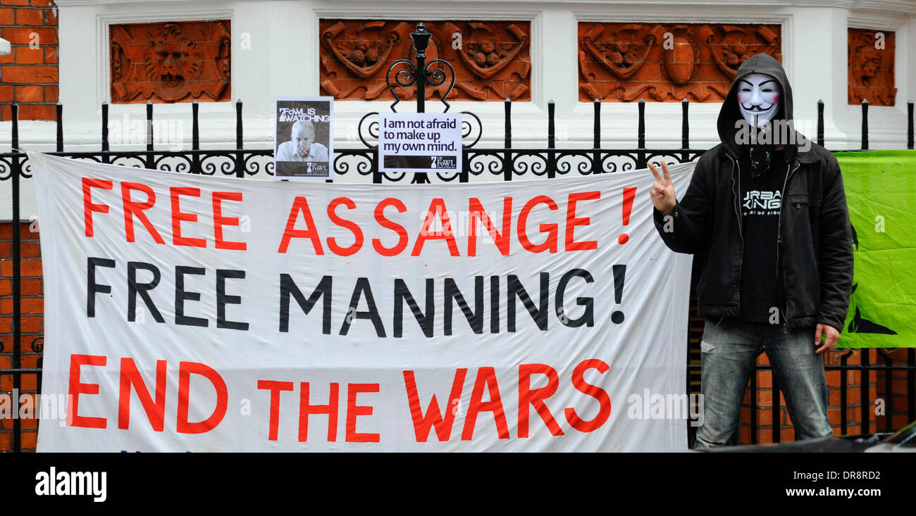 A lone member of the hacktivist group known as 'Anonymous' poses ...