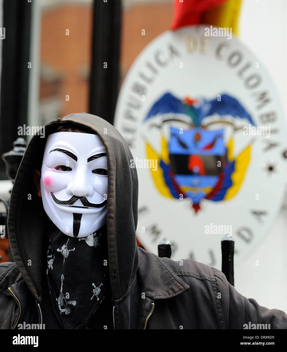 A lone member of the hacktivist group known as 'Anonymous' poses ...