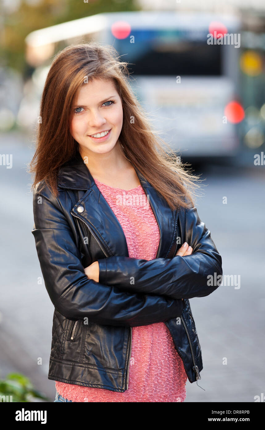 Girl at bus stop hi-res stock photography and images - Alamy