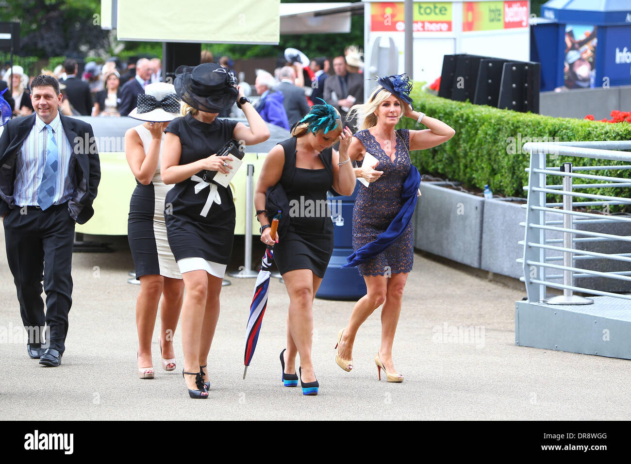Windy weather conditions have had the ladies holding onto their hats ...