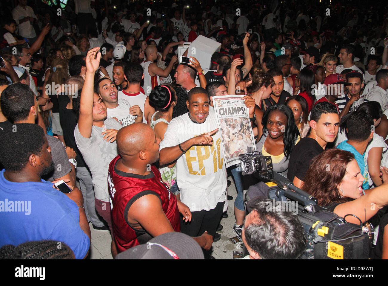 Atmosphere Fans celebrate outside the American Airlines Arena after ...