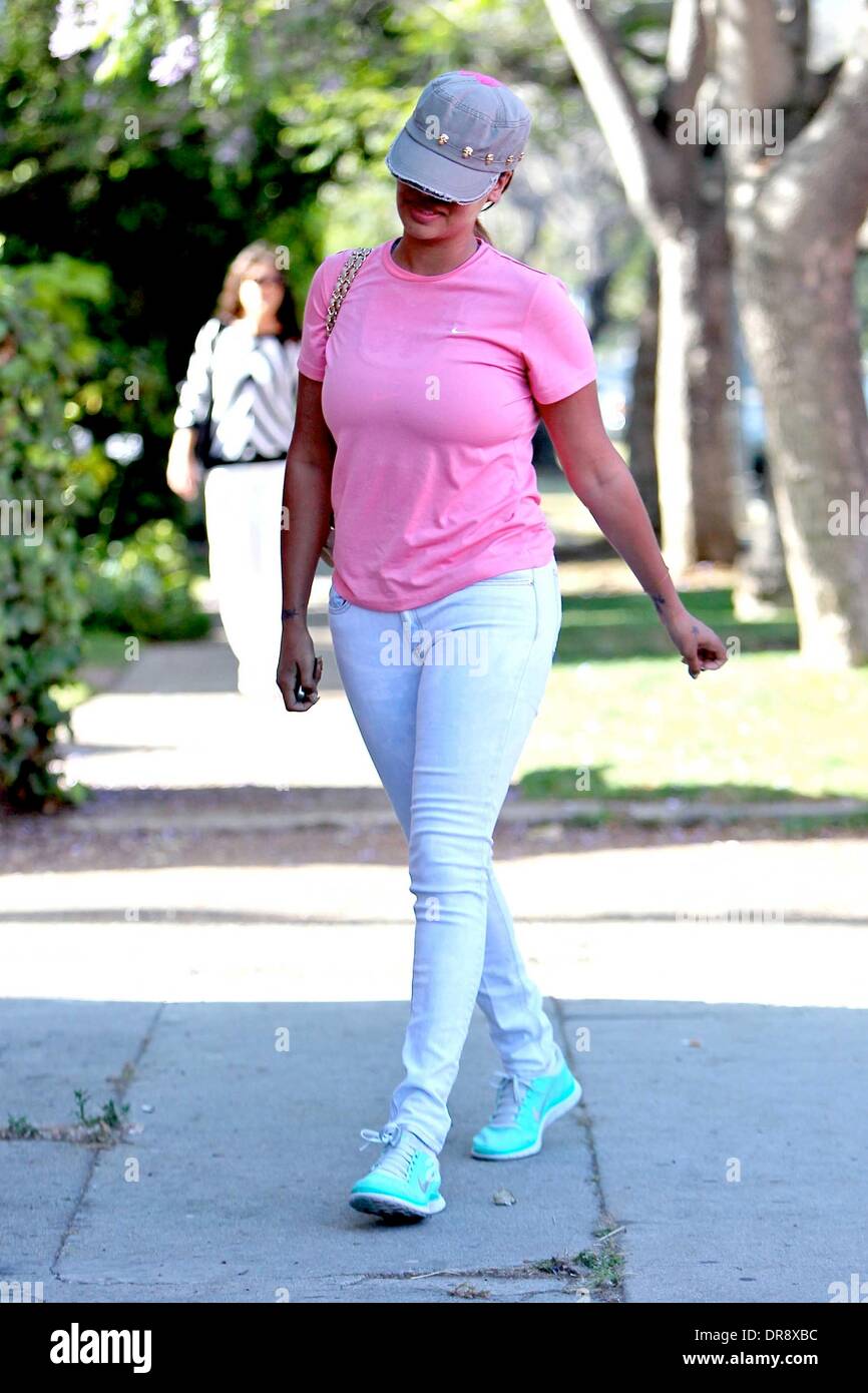 La La Anthony, formerly LaLa Vasquez, hiding under her cap as she ...