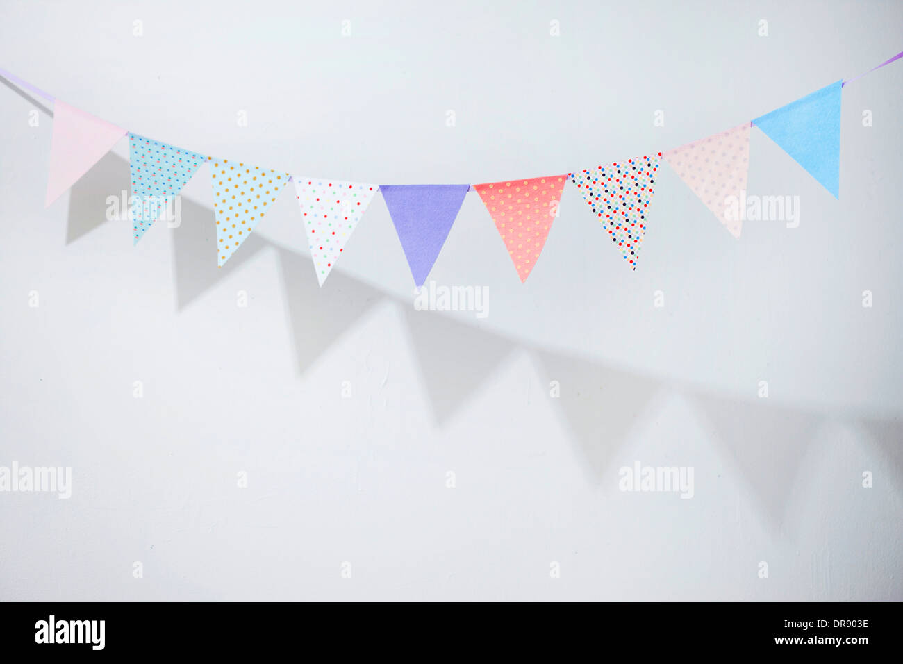 flags hanging in the string Stock Photo - Alamy