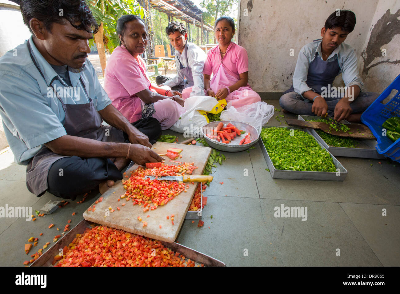 Preparing food at the Muni Seva Ashram in Goraj, near Vadodara, India ...