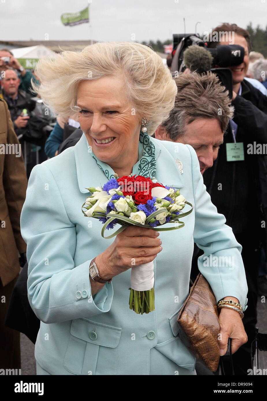 Camilla, Duchess of Cornwall arrives in windy conditions at the Royal ...