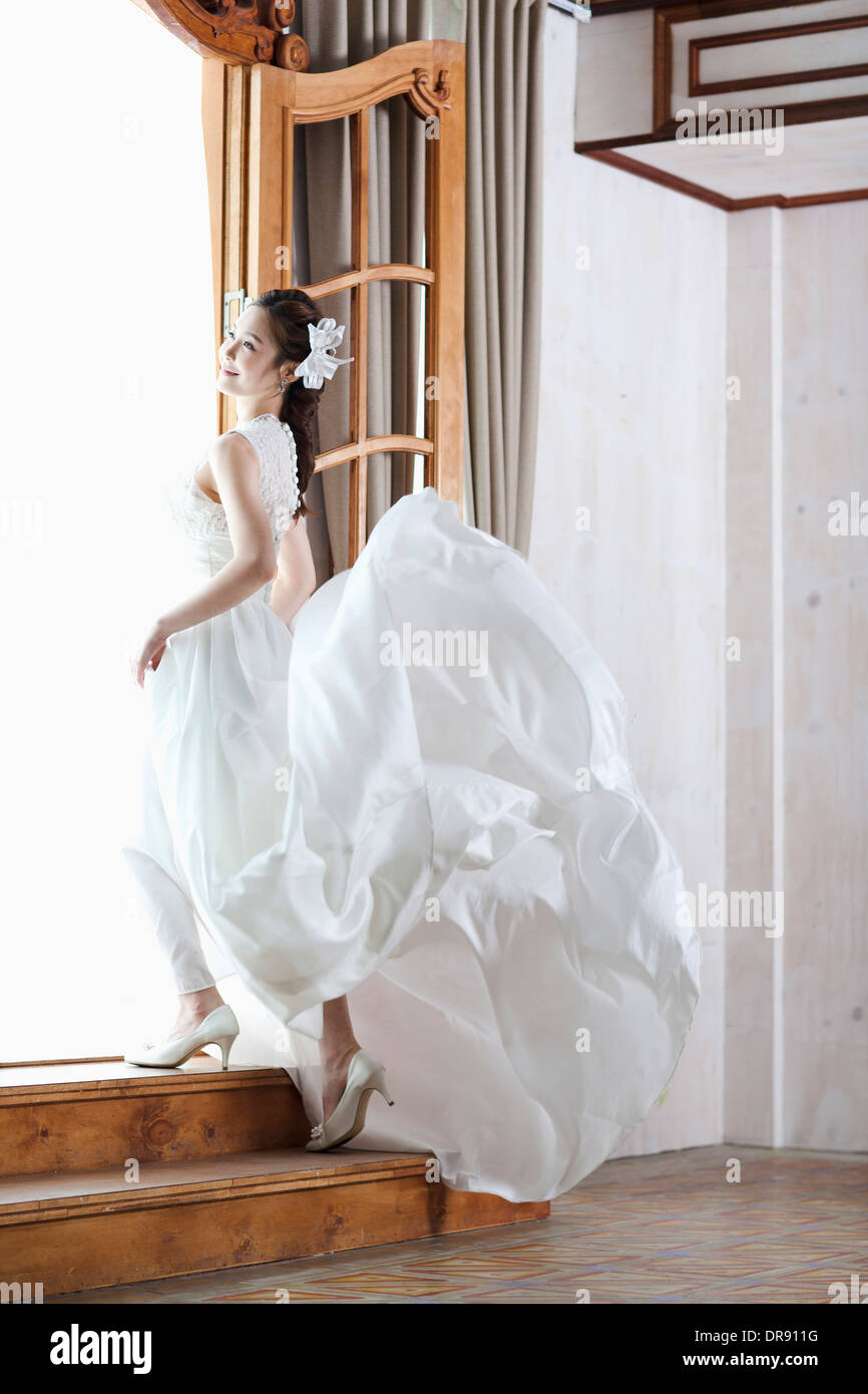 Female dress stairs hi-res stock photography and images - Alamy