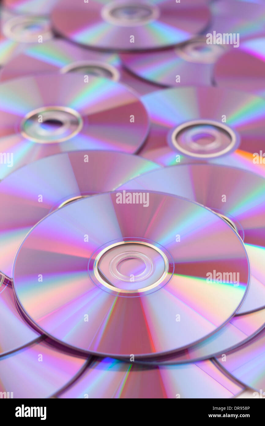 Many CD or DVD disks on each other Stock Photo - Alamy