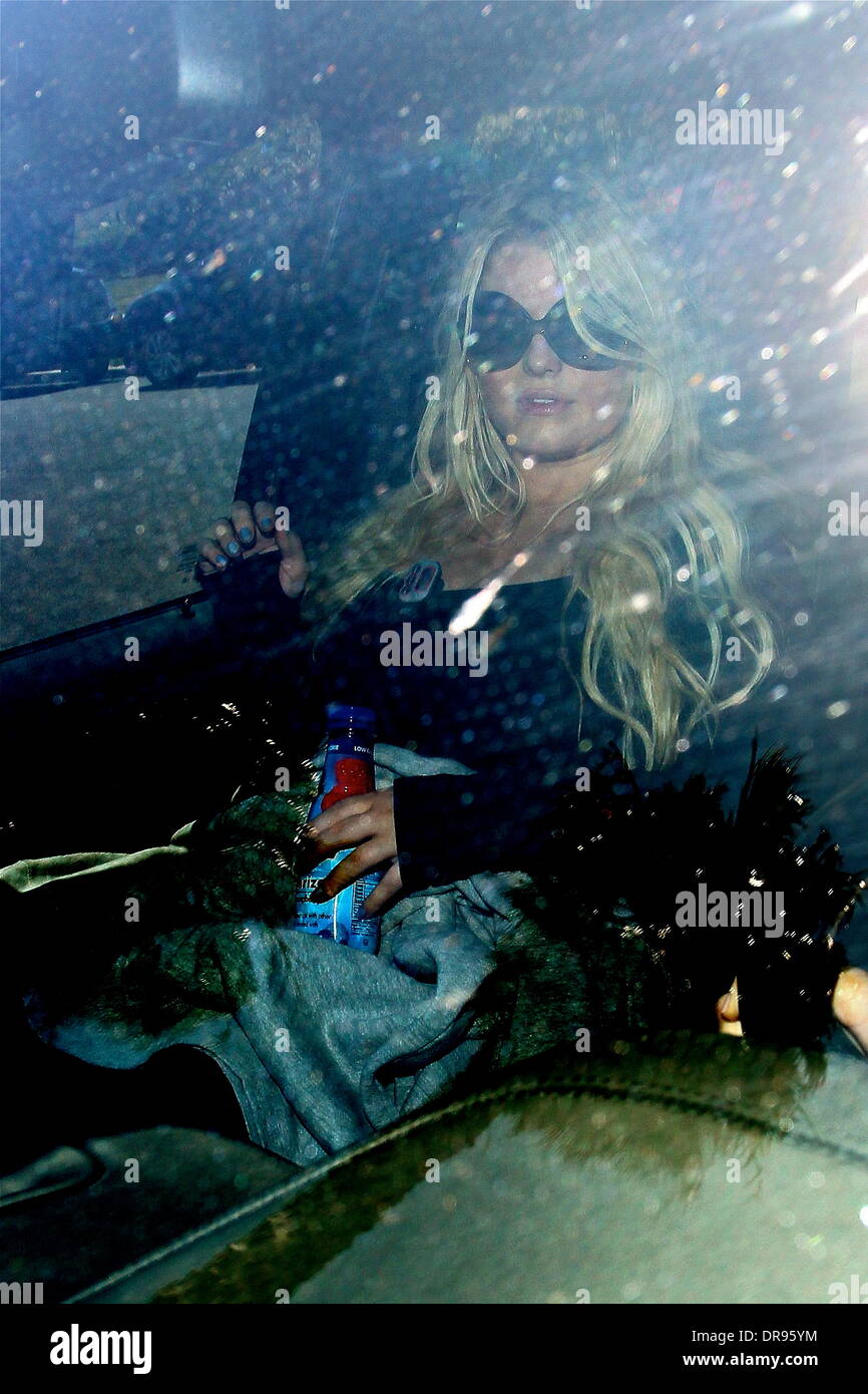 Jessica Simpson is photographed in her car as she leaves her personal ...