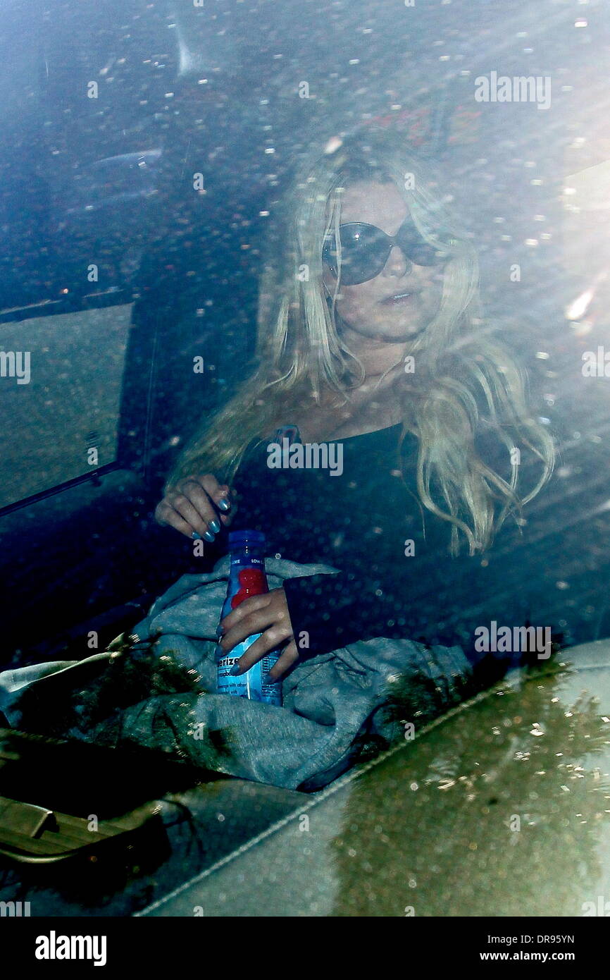 Jessica Simpson is photographed in her car as she leaves her personal ...