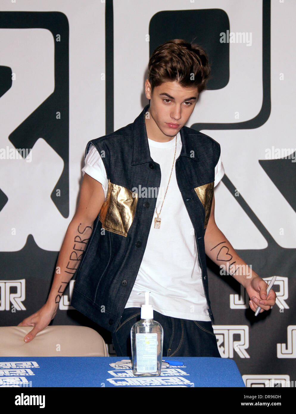 Justin Bieber at a cd signing for 'Believe' at JR Music World New York ...