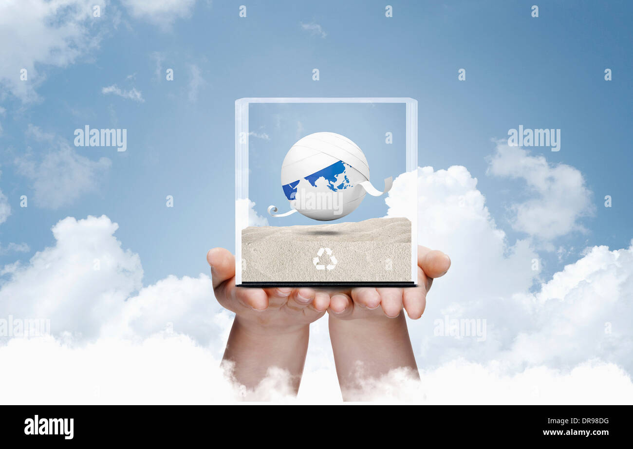 the globe inside a box with an eco sign Stock Photo - Alamy