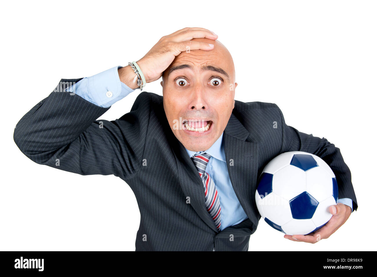Worried supporter with soccer ball isolated in white Stock Photo - Alamy